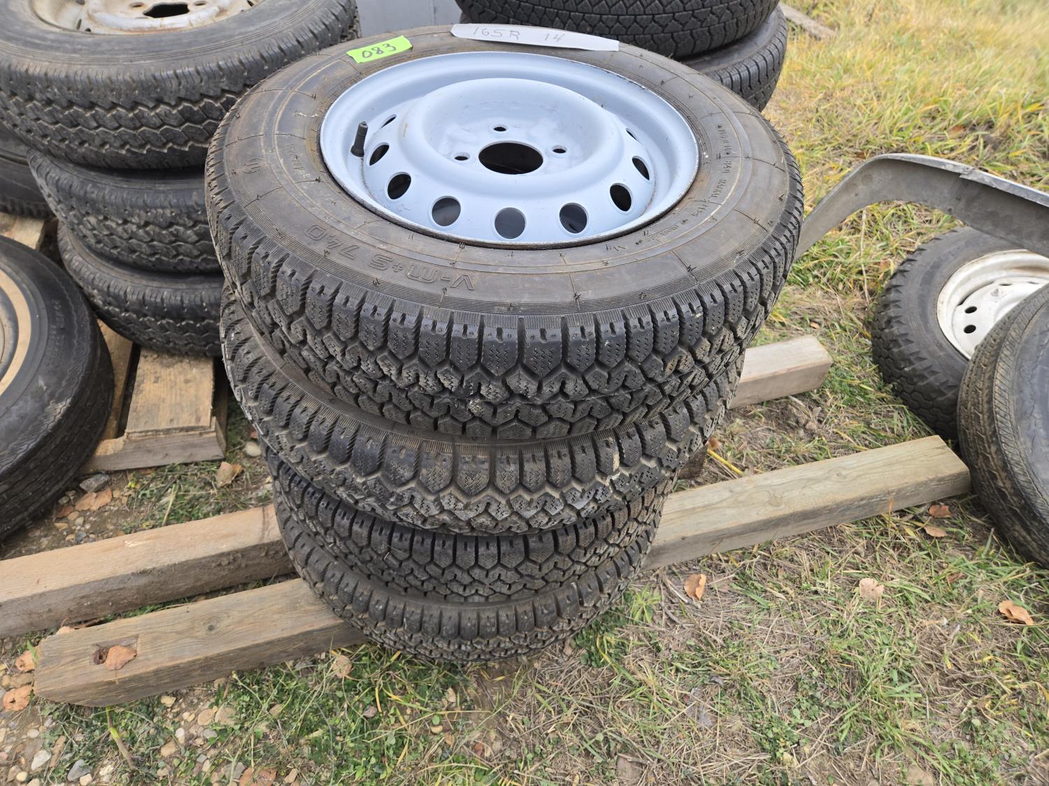 (4) 165R14 Tires On 4 Bolt Rims [24LG37001-083] | Team Auctions