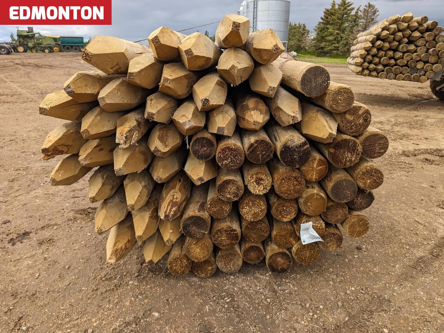 (70) 4-5 Inch X 10 Ft Treated Fence Posts [25FI10791-010] | Team Auctions