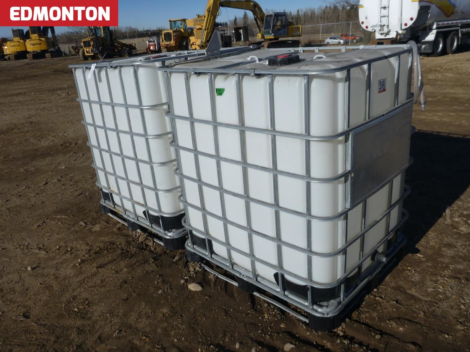 (2) 1,000 Liter Caged Poly Totes with Steel Pallet [25KL48002-006 ...