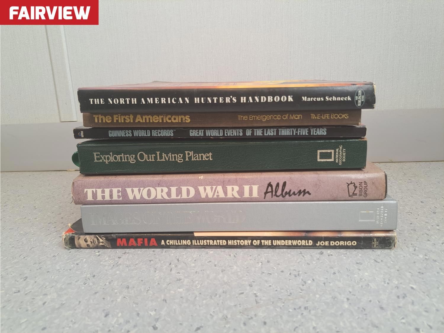 (7) Misc World Record & History Books [26BD92002-011] | Team Auctions