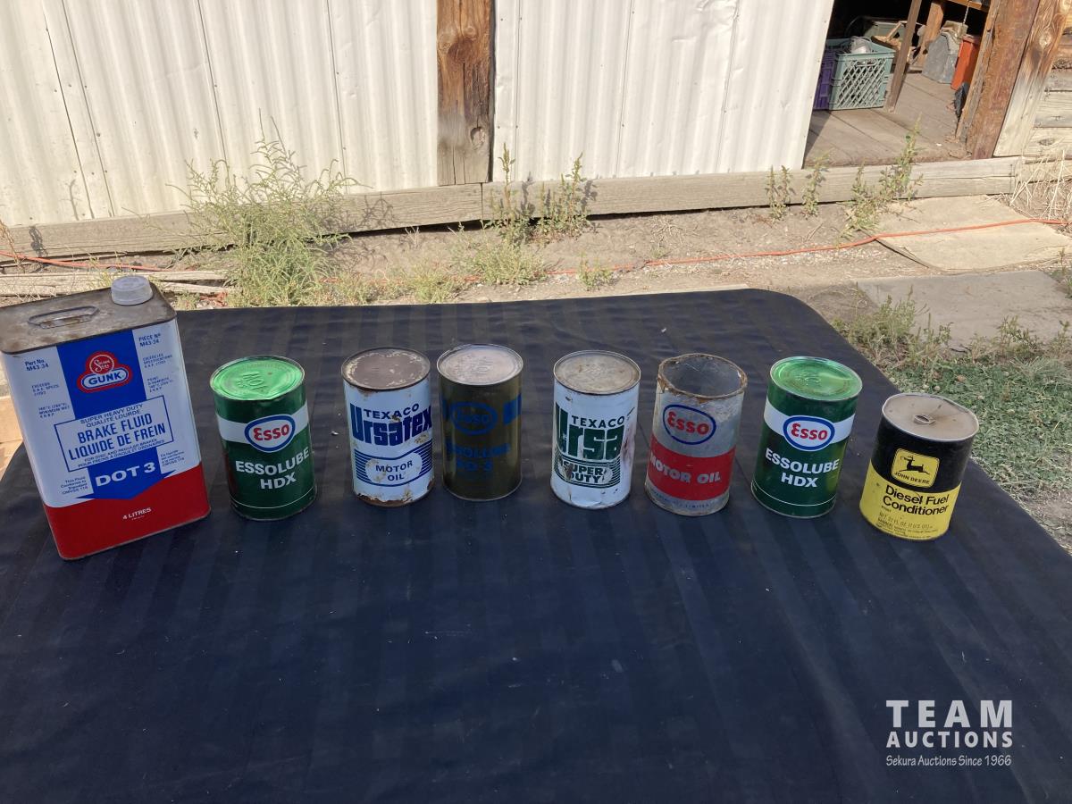(7) Oil Cans & Brake Fluid Can [24FI02001-942] | Team Auctions