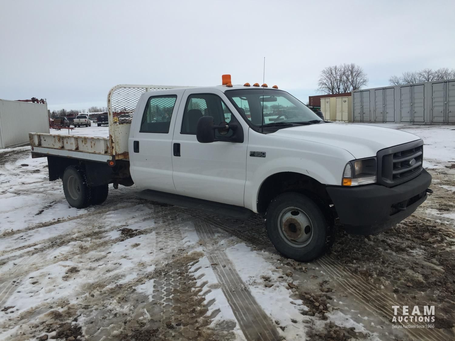 2002 Ford F350 SD Lariat Crew Cab 4X4 Crew Cab Flat Deck Truck [24CA02035-003] | Team Auctions