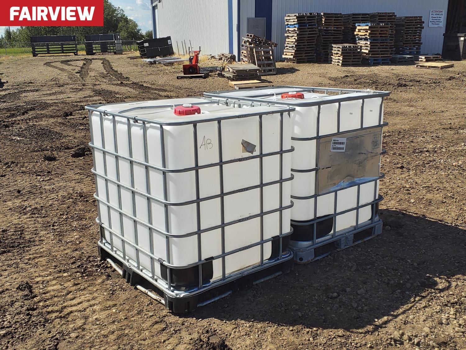 (2) 1000 Liter Non Potable Water Totes [25IE06008-002] | Team Auctions