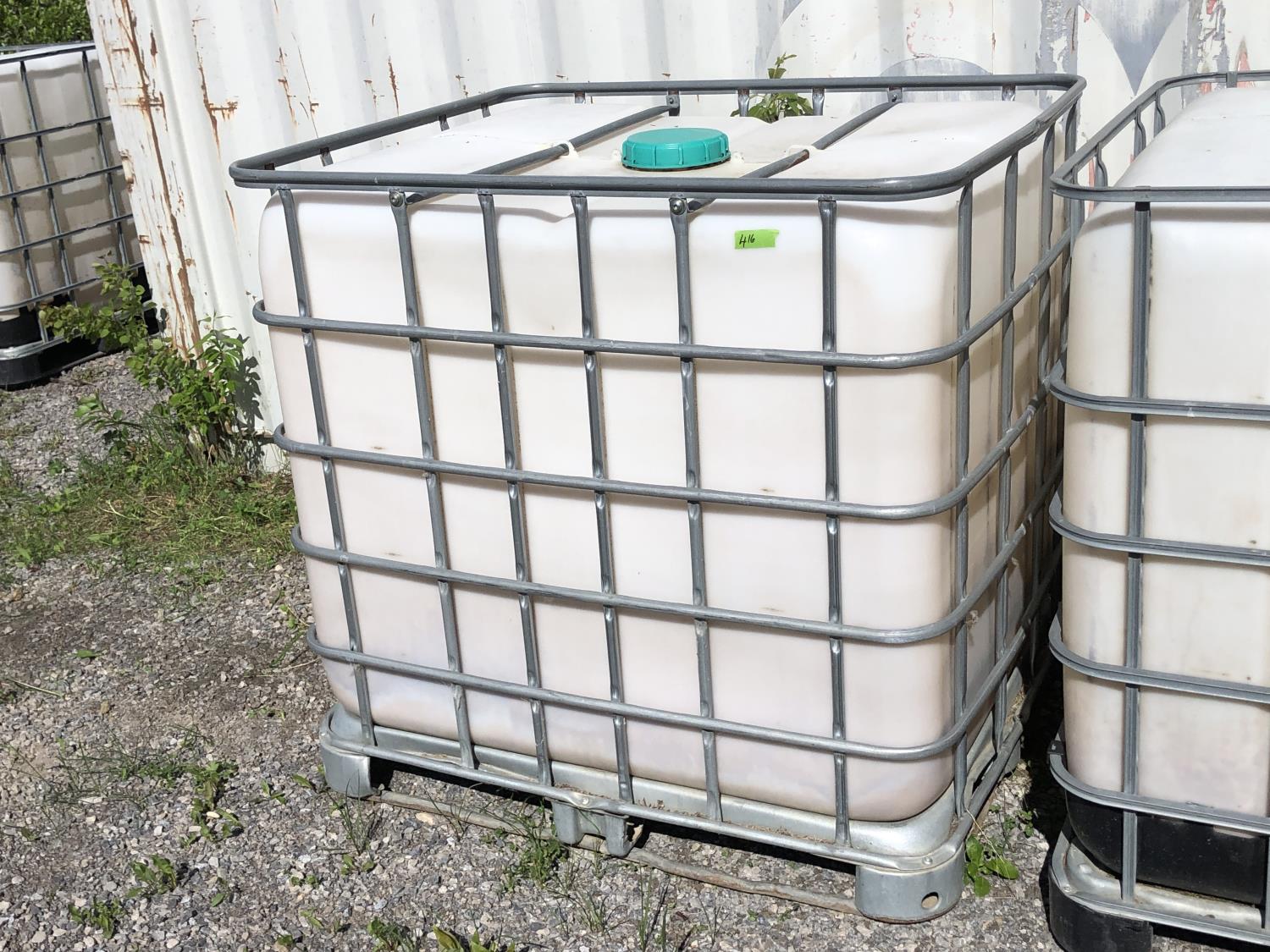 1000 Liter Caged Poly Tank [24FQ18001-417] | Team Auctions